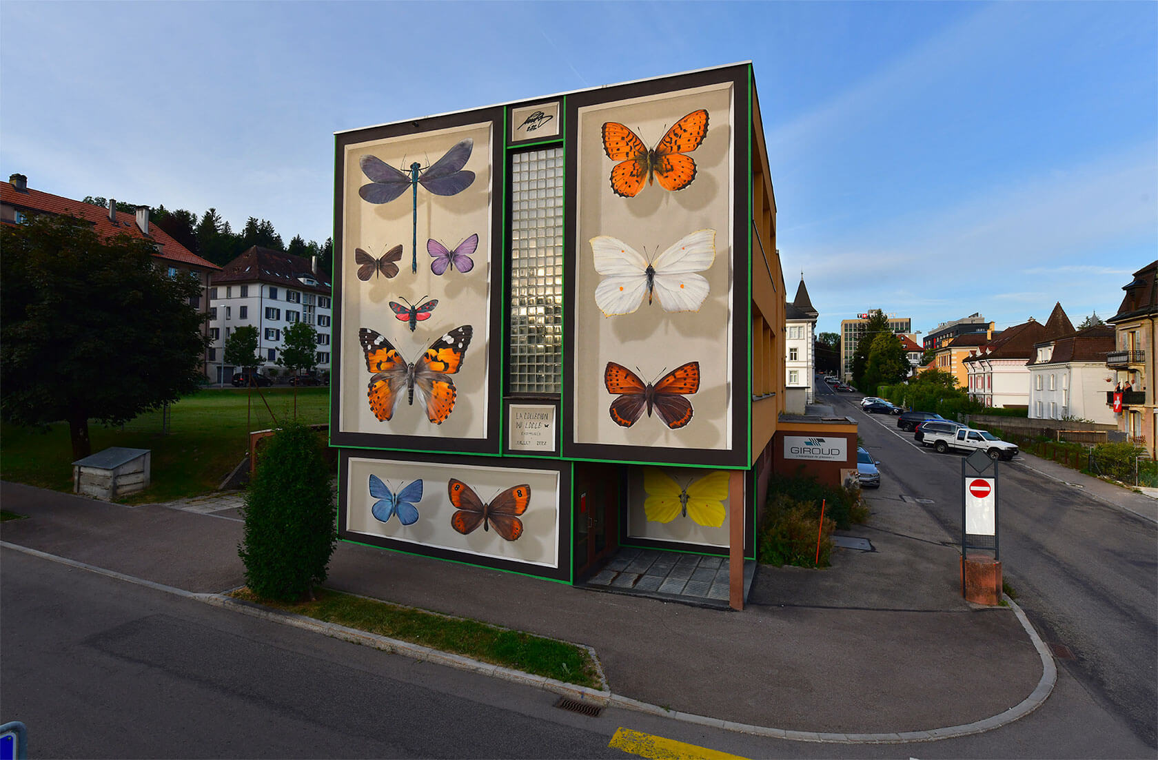 Huge Butterfly Murals Bring Buildings to Life