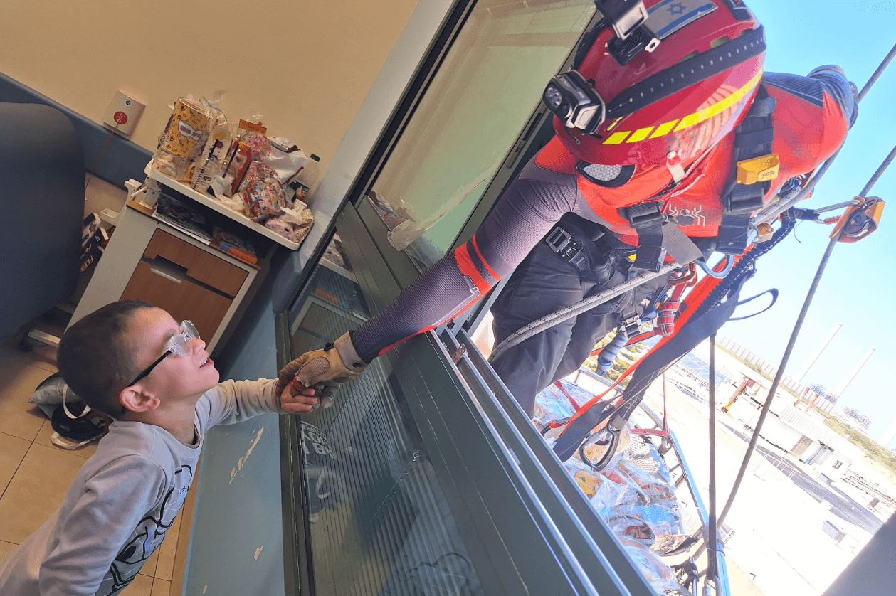 Firefighters Rappel Down Building as Superheroes for Disabled Youth ...