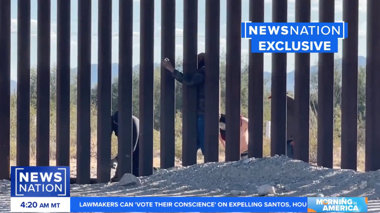 Human traffickers seen in news footage cutting through border wall with ...