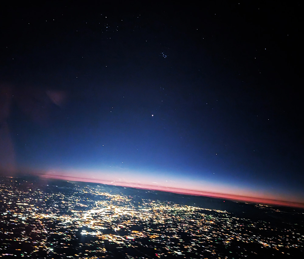 Jupiter (and a comet!) from an airplane window