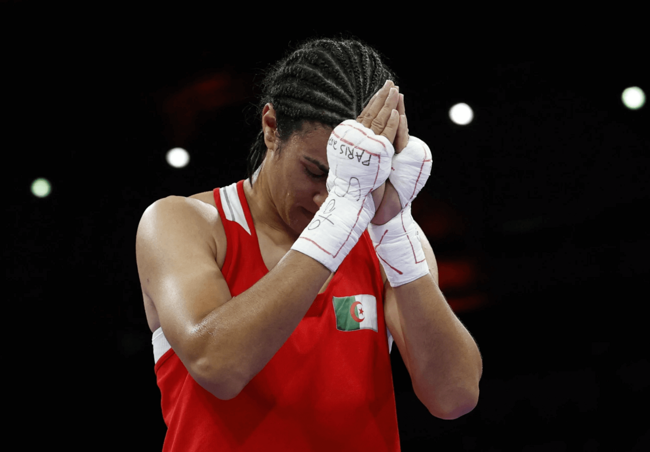 Boxer Advances to Gold Medal Round Despite Gender Test Controversy